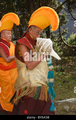 Buddhist Monks Blowing Conch Shells During Ritual at Thikse Monastery ...