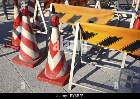 Prohibition cones and temporary signs placed on pavement in road ...