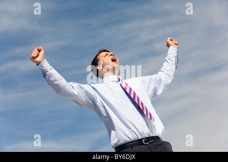Photo of happy winner businessman screaming from joy Stock Photo - Alamy