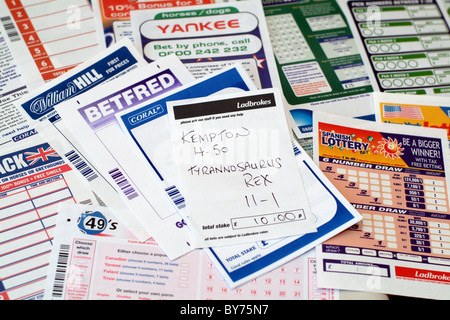 betting slips on the racing pages of a newspaper Stock Photo - Alamy