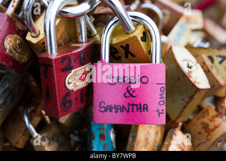 First love lock locks on the Milvio bridge chained to wall Rome Italy ...