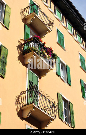 Tyrolean style house with windows and decorations Stock Photo - Alamy
