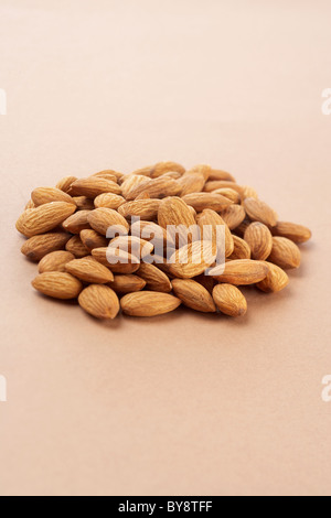 Group of almonds with its skin Stock Photo - Alamy