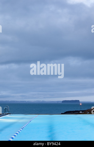 The swimming pool in Hofsós, Iceland, has a great view over ...