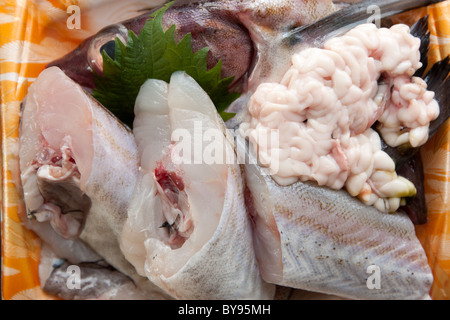 Preparing 'shirako' (cod sperm) to eat as part of a Japanese 'nabe ...