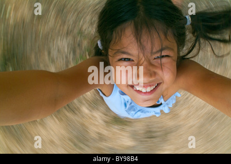 Young girl being spun around by her father, France Stock Photo - Alamy