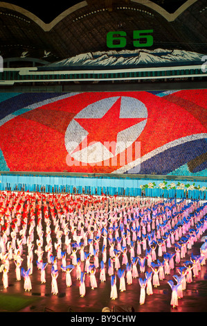 PYONGYANG, North Korea - North Korean flags fly in front of the Tower ...