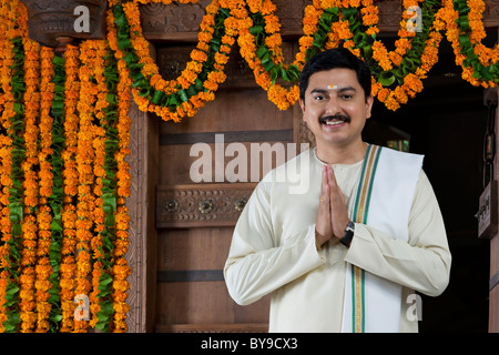 Portrait of South Indian man greeting Stock Photo - Alamy