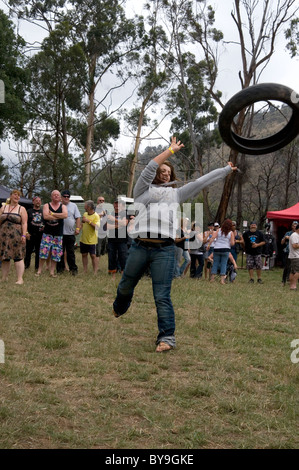 tire throw competition Stock Photo - Alamy