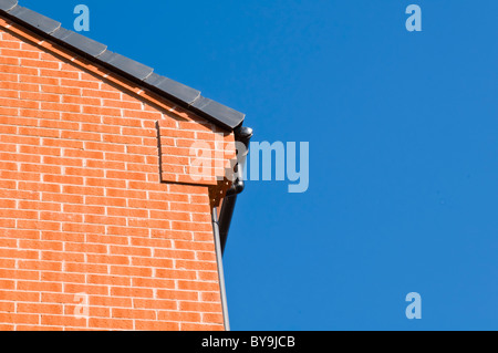 Gable end of red brick house showing corbelling and soldier brickwork ...