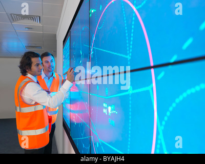 Air traffic control radar screen of aircraft above Luton airport, UK ...