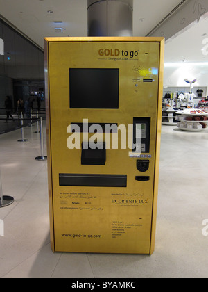 A gold bar ATM machine in Dubai Stock Photo - Alamy