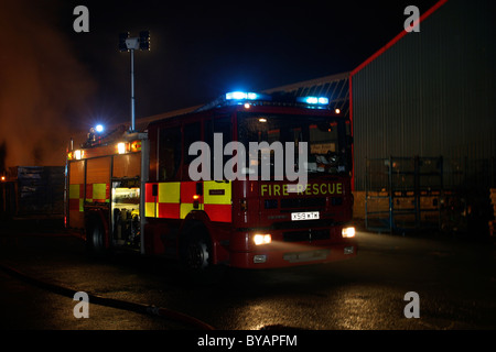 Fire engine hose locker at night Stock Photo - Alamy