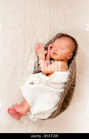 A newborn (1 week old) baby being examined by a pediatrician Stock ...