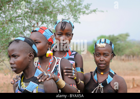 Young girls from the Hamar tribe in the initiation ritual "leap over ...