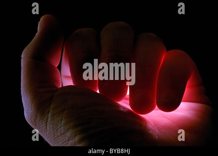 Light captured in child's hand Stock Photo - Alamy
