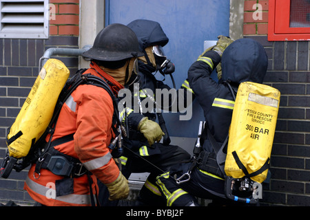 Firefighters in breathing apparatus BA BASCA are briefed before Stock ...