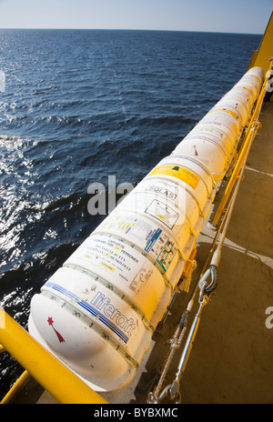 Row of SOLAS life raft capsules at car ferry , Finland Stock Photo - Alamy