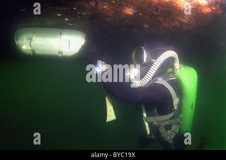 Ukrainian underwater special forces. Military diver with submachine gun ...