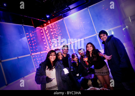 Guests at the nightclub 21 Fahrenheit, India's first ice bar, in Mumbai ...