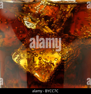 Cup of tasty cold cola drink with french fries on wooden table Stock ...