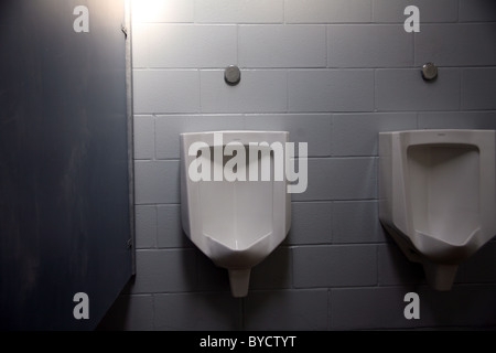 Two urinals in a public restroom New York City USA Stock Photo - Alamy
