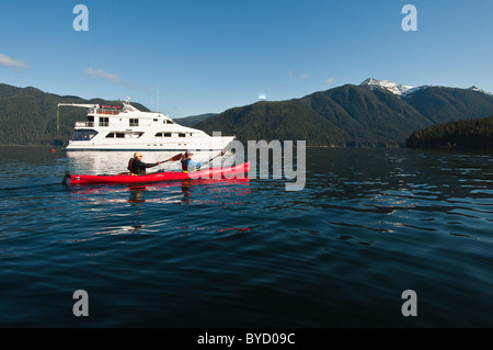 Alaska. Safari Quest and kayakers in Windham Bay in the Chuck River ...