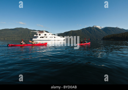 Alaska. Safari Quest and kayakers in Windham Bay in the Chuck River ...