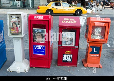 Free newspaper boxes on the street, New York City, America, USA. A ...