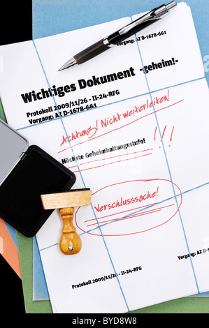 Papers, lettering "Wichtiges Dokument", German for "important document ...