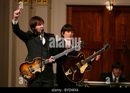 The Beatles tribute band Beatlemania, again. Beatle re-enactors ...
