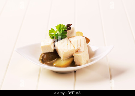 Cubes of marinated feta cheese and pickles Stock Photo - Alamy