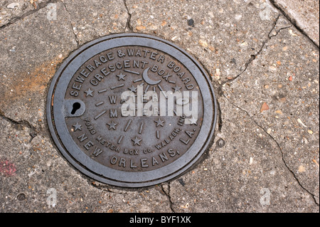 Cast iron water meter cover Stock Photo - Alamy
