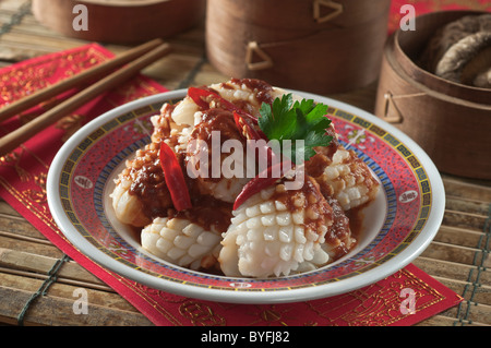 Chilli squid Chinese food Stock Photo - Alamy