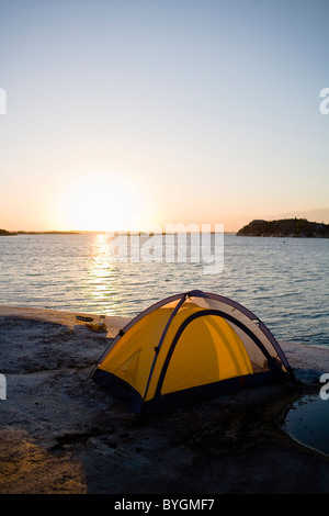 Sunset over the sea, sunset over the tent. Tent by the sea Stock Photo ...