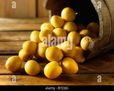 Date fruit on wooden background, close up Stock Photo - Alamy