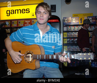 Brian McFadden performs his new single 'like Only a Woman Can' at HMV ...