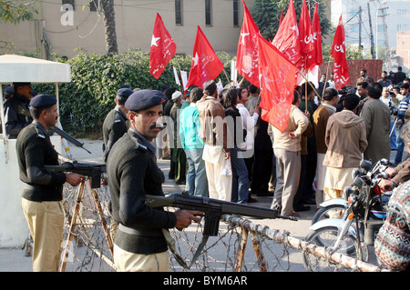 Police stand guard during a protest outside the Iranian Embassy in ...