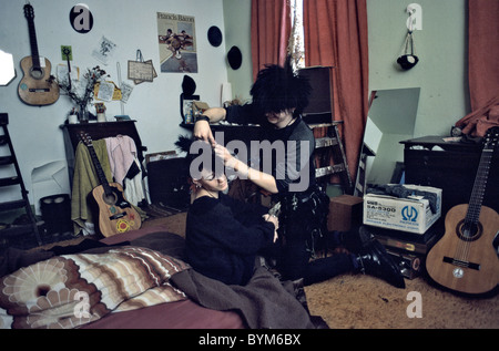 Punks in a London squat fixing their hair Stock Photo - Alamy