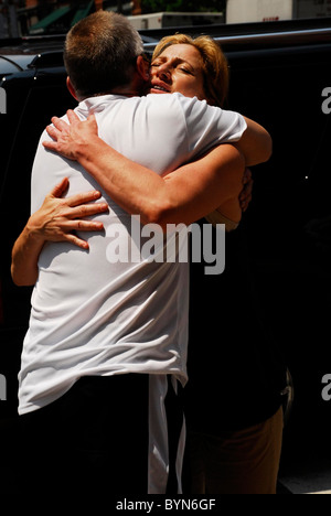Edie Falco takes a walk in the sunshine with her son Anderson Falco ...