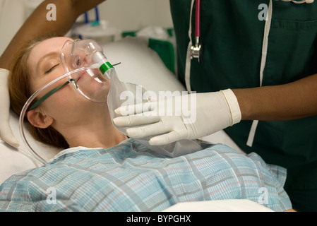 Patient receiving oxygen treatment Stock Photo - Alamy