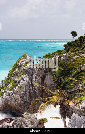 Rocky cliff at the tropical beach of Tulum, Yucatan Peninsula, Mexico ...
