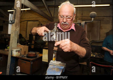 A 75 year old man still working in his own business as a craftsman ...