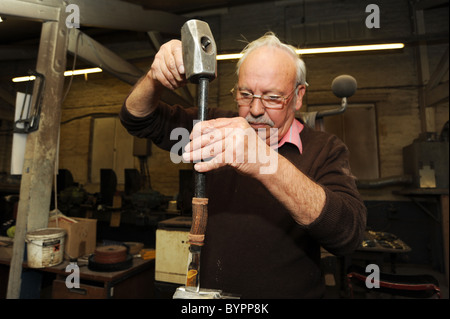 A 75 year old man still working in his own business as a craftsman ...