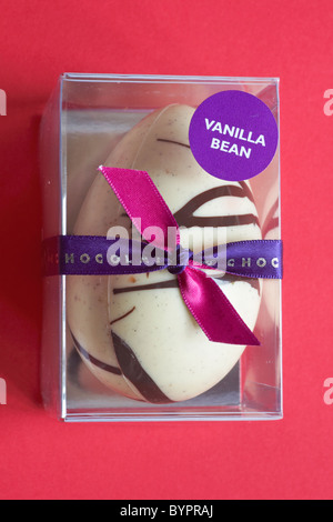 Vanilla bean white chocolate Easter egg on white background Stock Photo ...