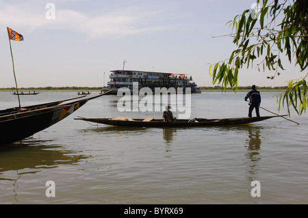 Mali, Niger Inland Delta. A pirogue under sail on the Niger River ...