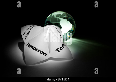 Globe and Paper Fortune Teller for background Stock Photo - Alamy