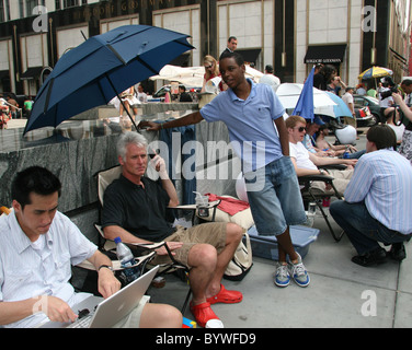 People camping outside the Apple Store for the iPhone to go on sale ...