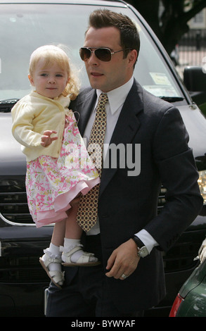Shane Filan with daughter Nicole and wife Gillian at the christening of ...