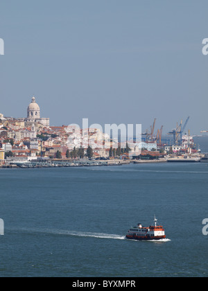 Boat "Cacilheiro" crossing Rio Tejo from Cacilhas to Cais do sodré ...